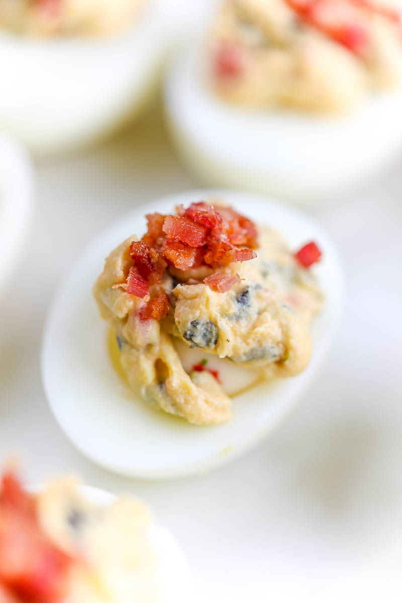 Bacon Deviled Eggs Made with Spinach & Artichoke Dip